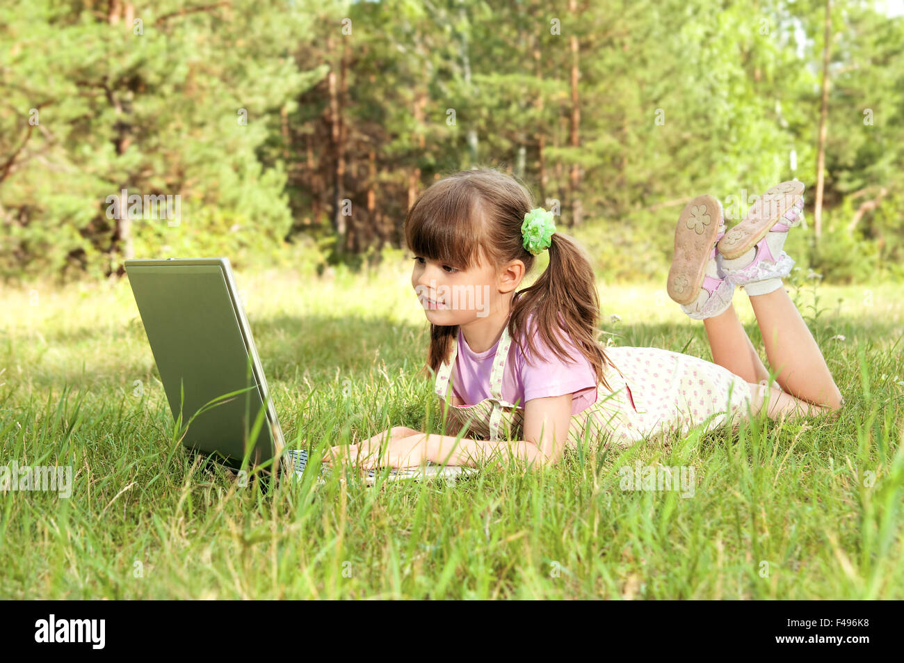 little girl with computer Stock Photo - Alamy