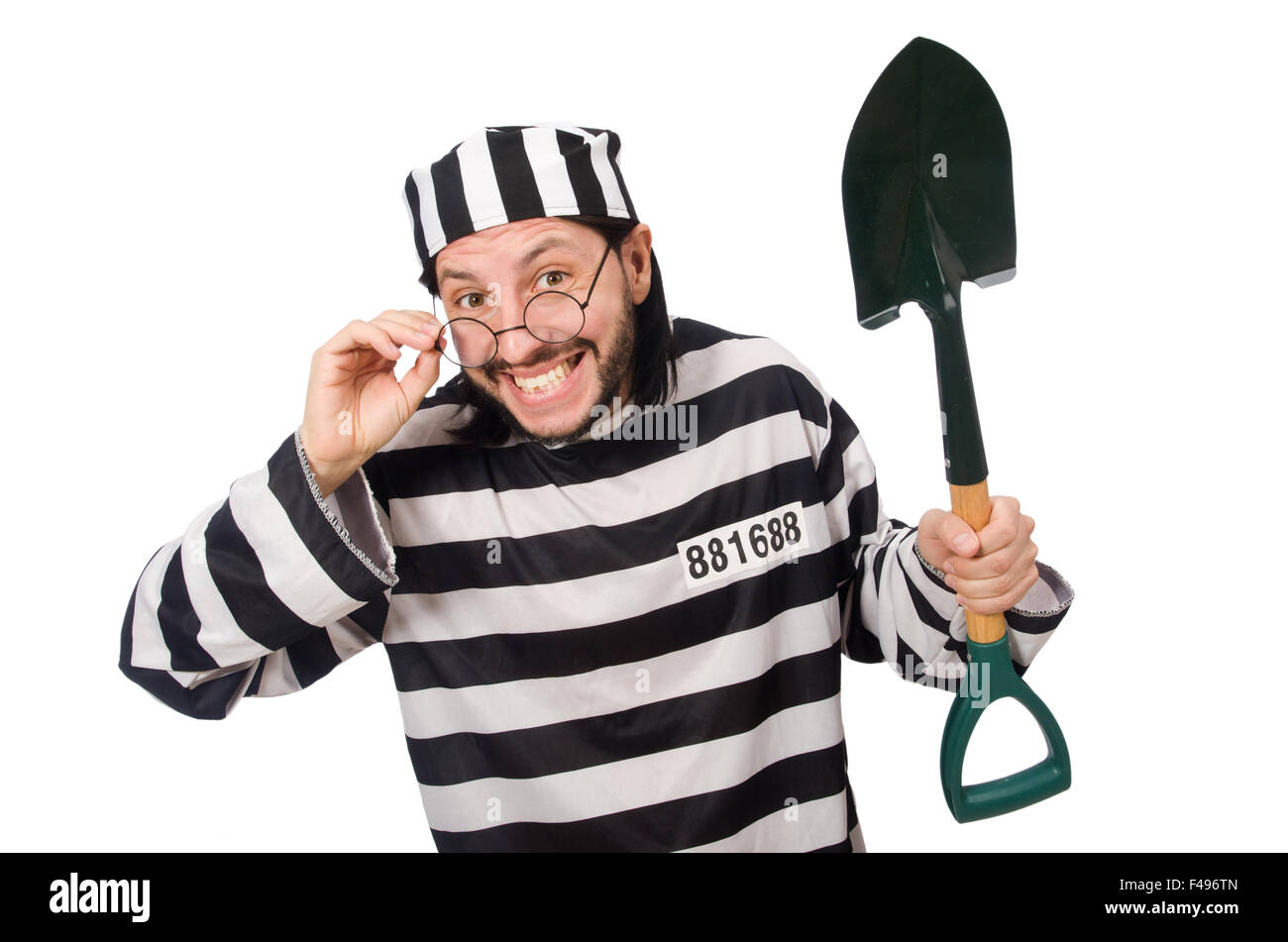 Prison inmate with spade isolated on white Stock Photo - Alamy
