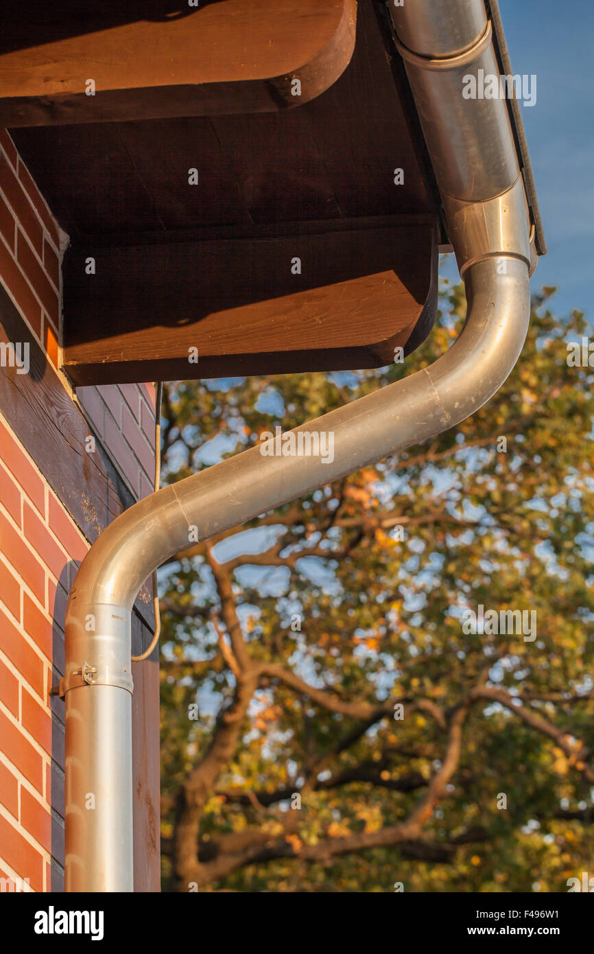 gutter pipe and brick wall Stock Photo - Alamy