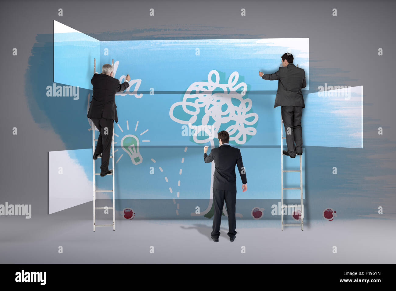 Composite image of business team writing Stock Photo - Alamy