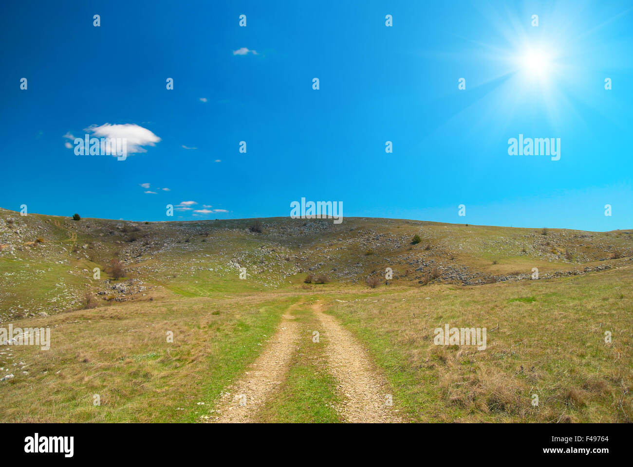 Road over hills Stock Photo - Alamy