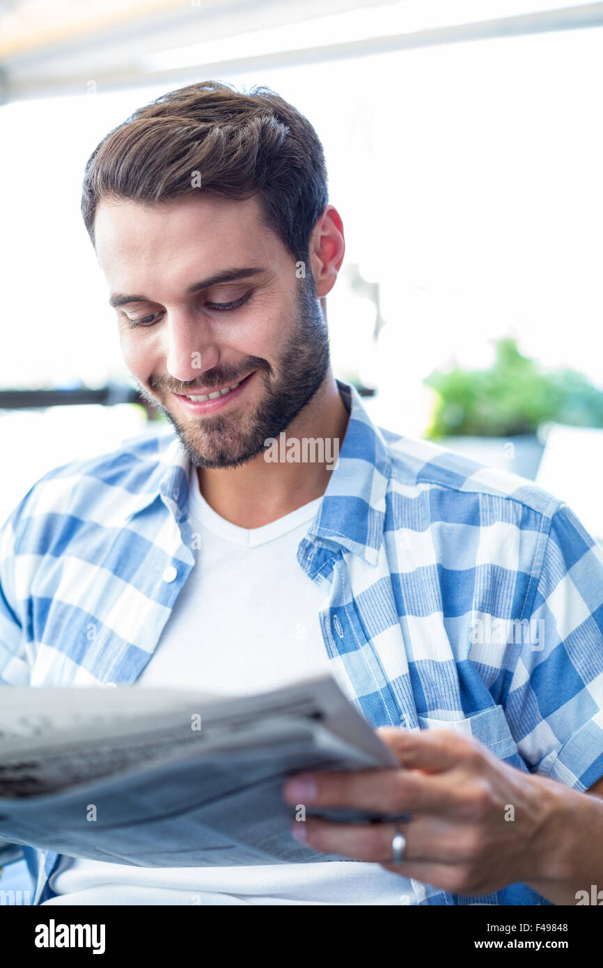 Young man reading the newspapers Stock Photo - Alamy Young man reading the newspapers Stock Photo - Alamy
