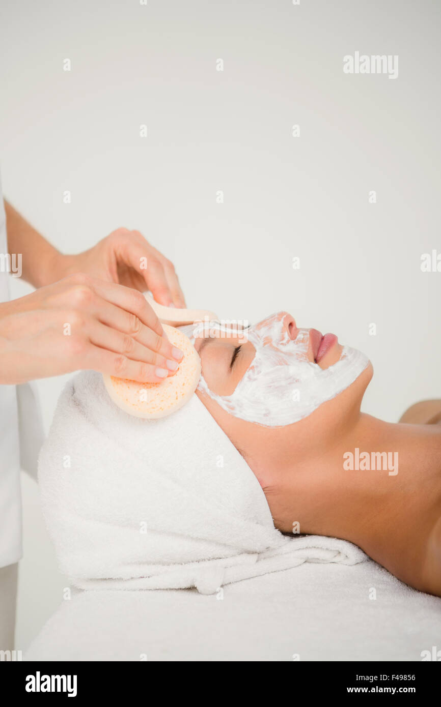 Hand cleaning womans face with cotton swabs Stock Photo - Alamy