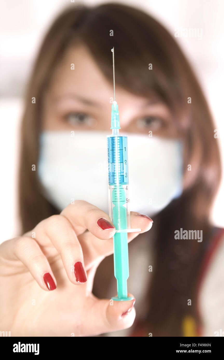 girl with syringe Stock Photo - Alamy