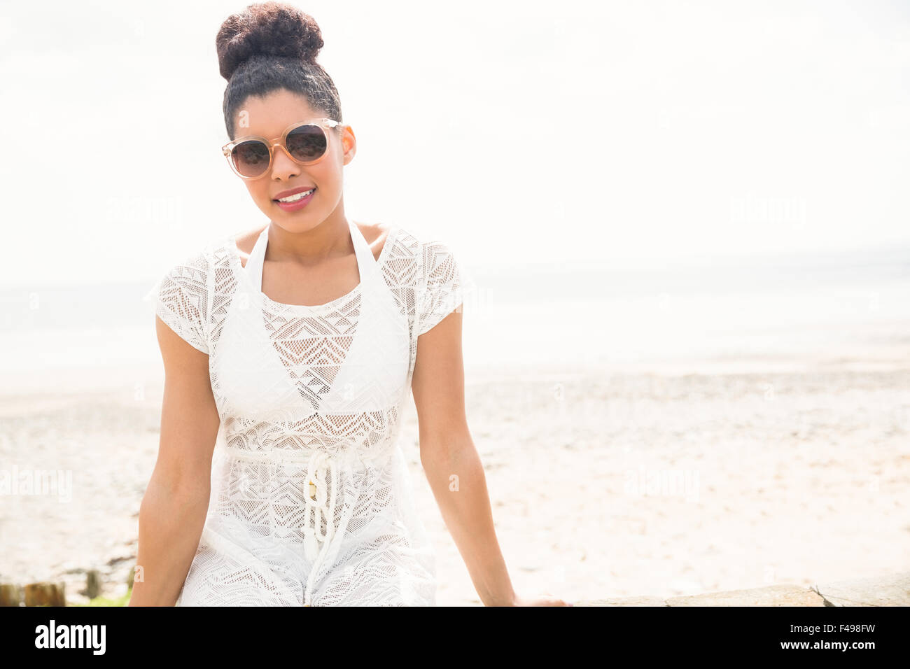 Pretty woman in sun dress Stock Photo - Alamy