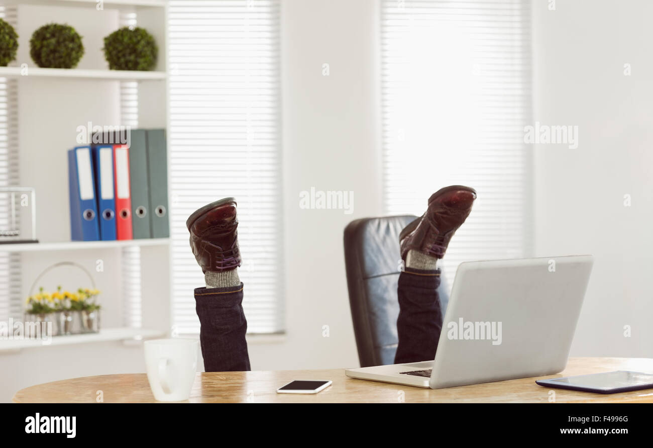 Businessman upside down at his desk Stock Photo - Alamy