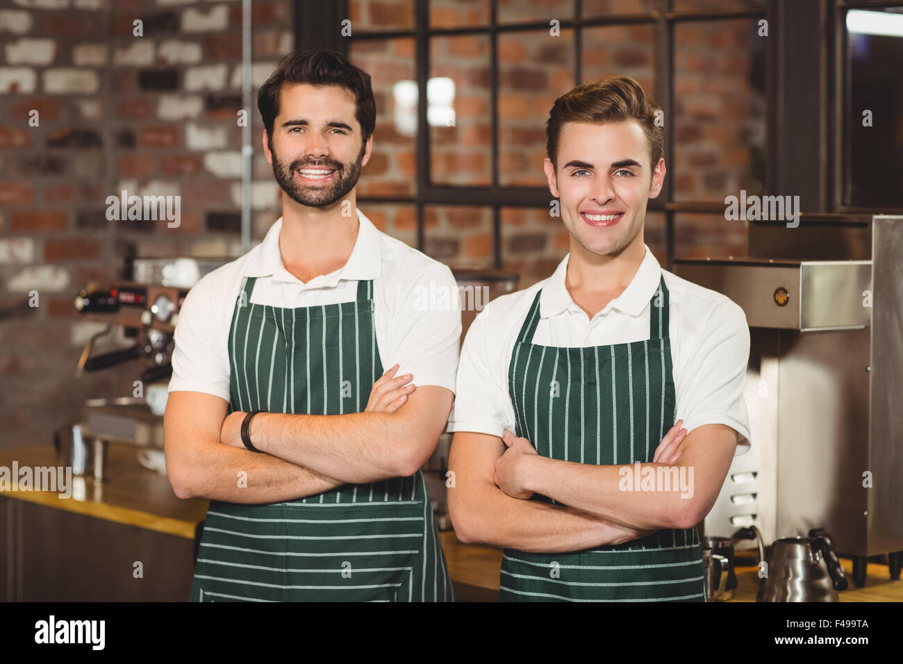 Smiling baristas looking camera hi-res stock photography and images - Alamy