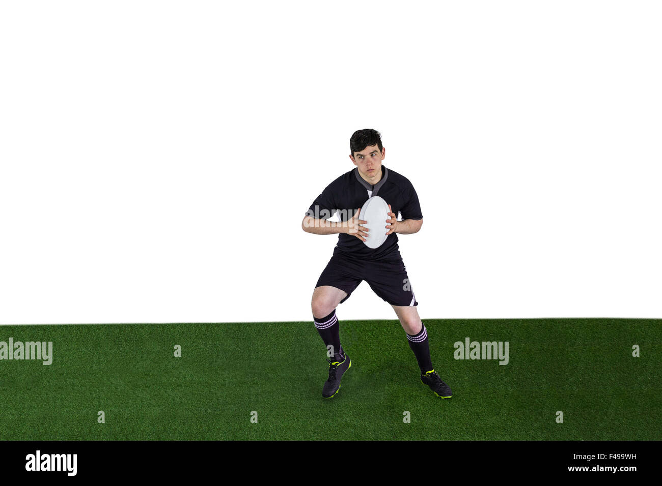 Rugby player running with the rugby ball Stock Photo - Alamy