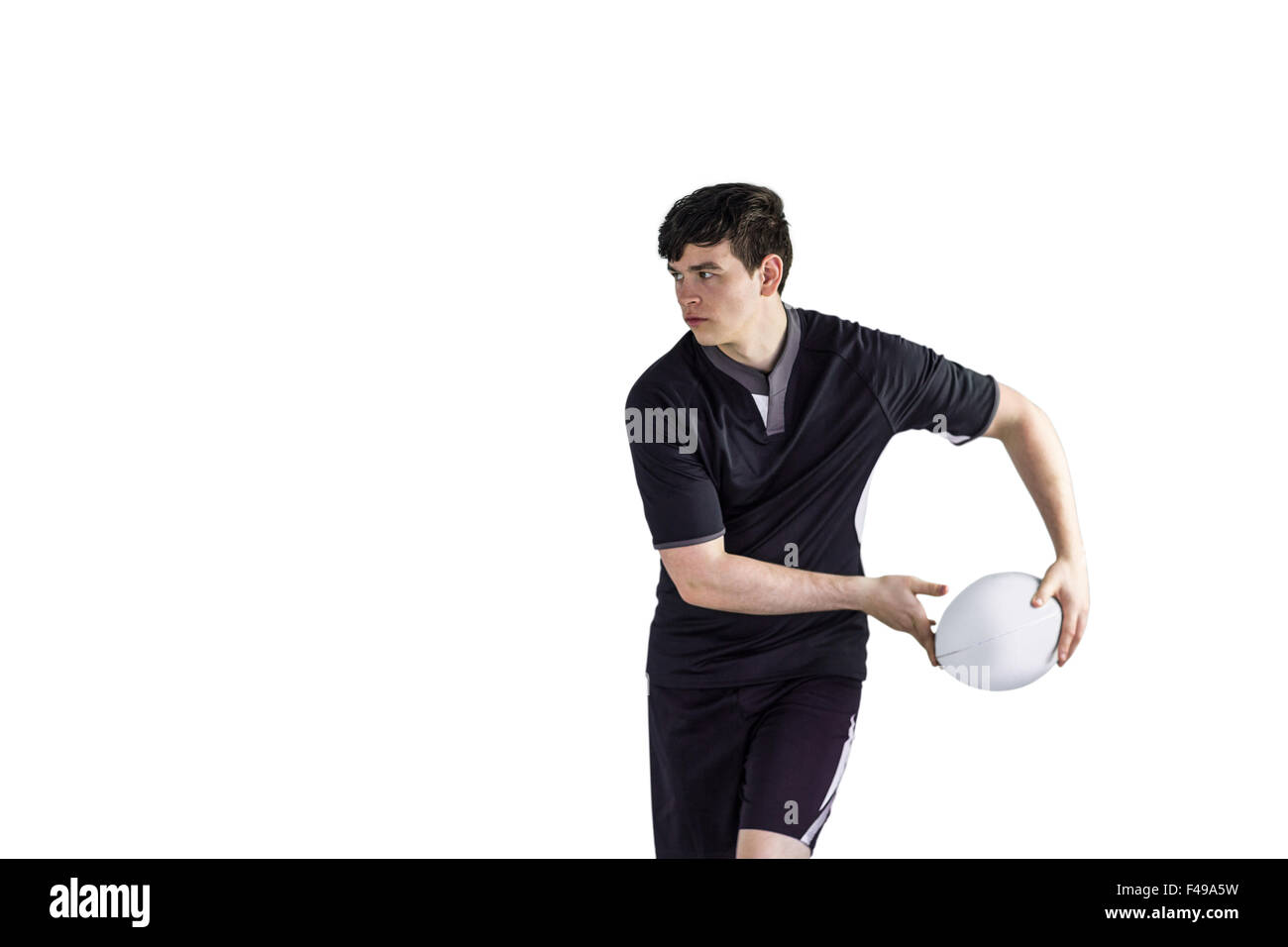 Rugby player doing a side pass Stock Photo - Alamy