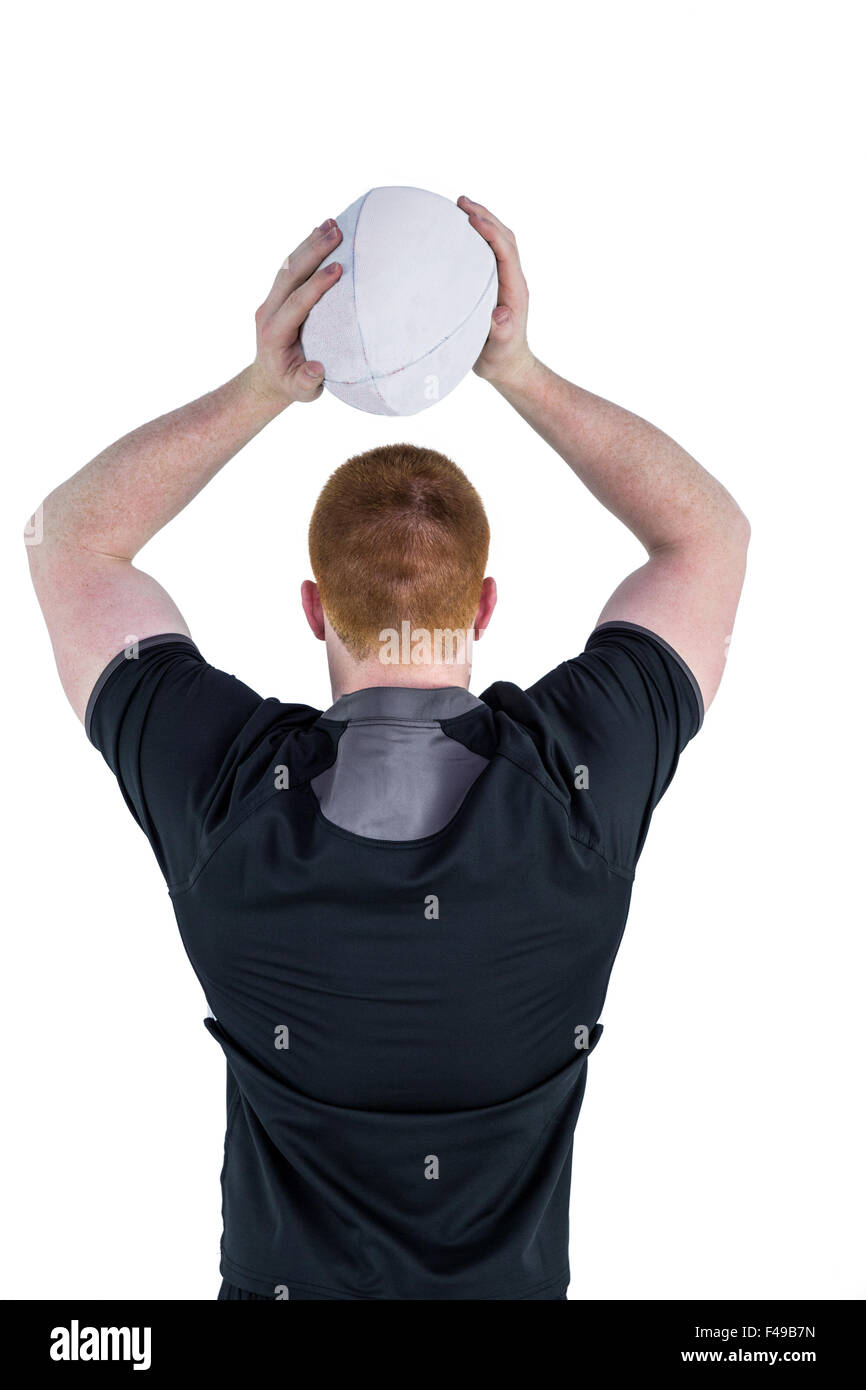 Rugby player about to throw a rugby ball Stock Photo - Alamy