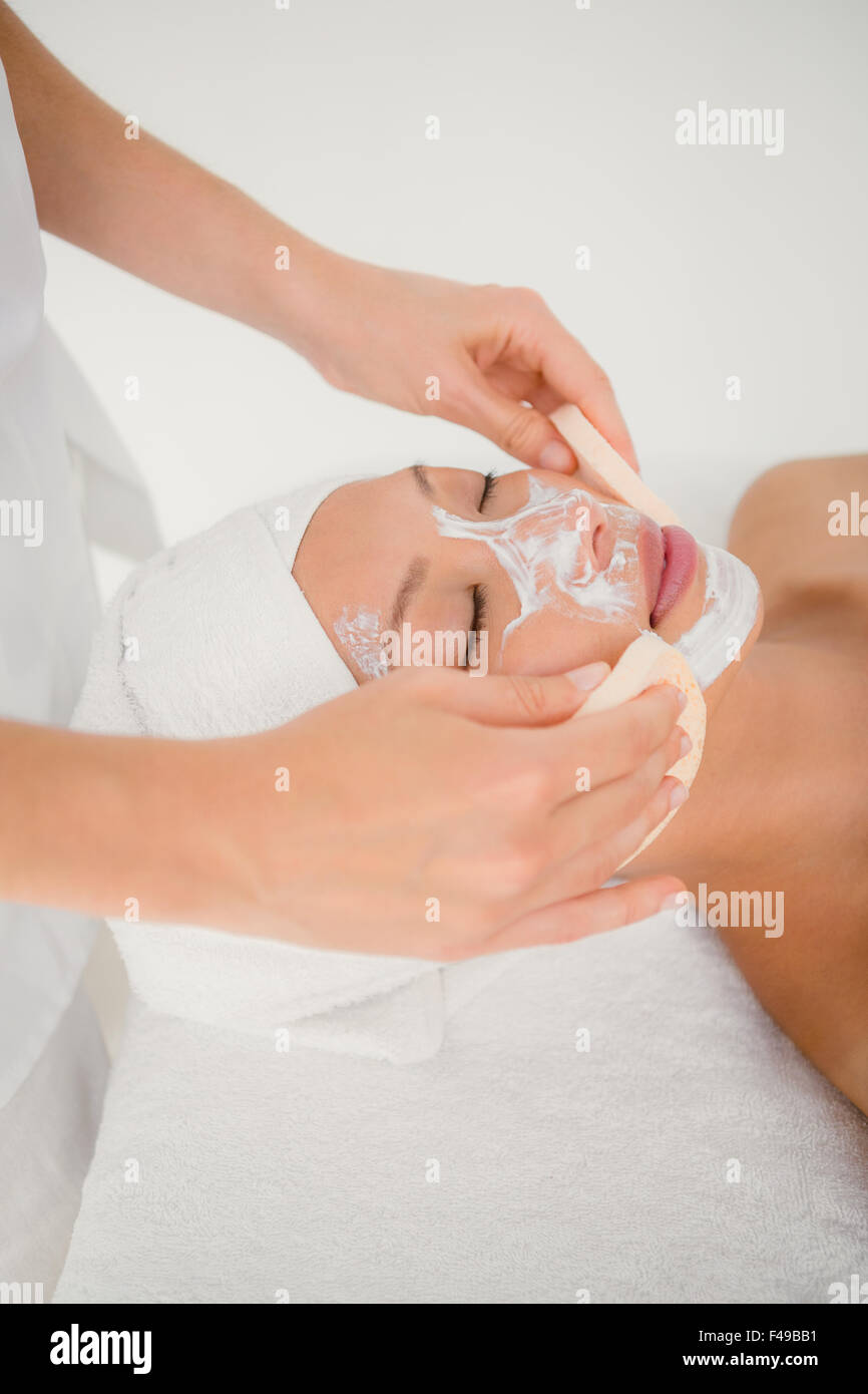 Hand cleaning womans face with cotton swabs Stock Photo - Alamy