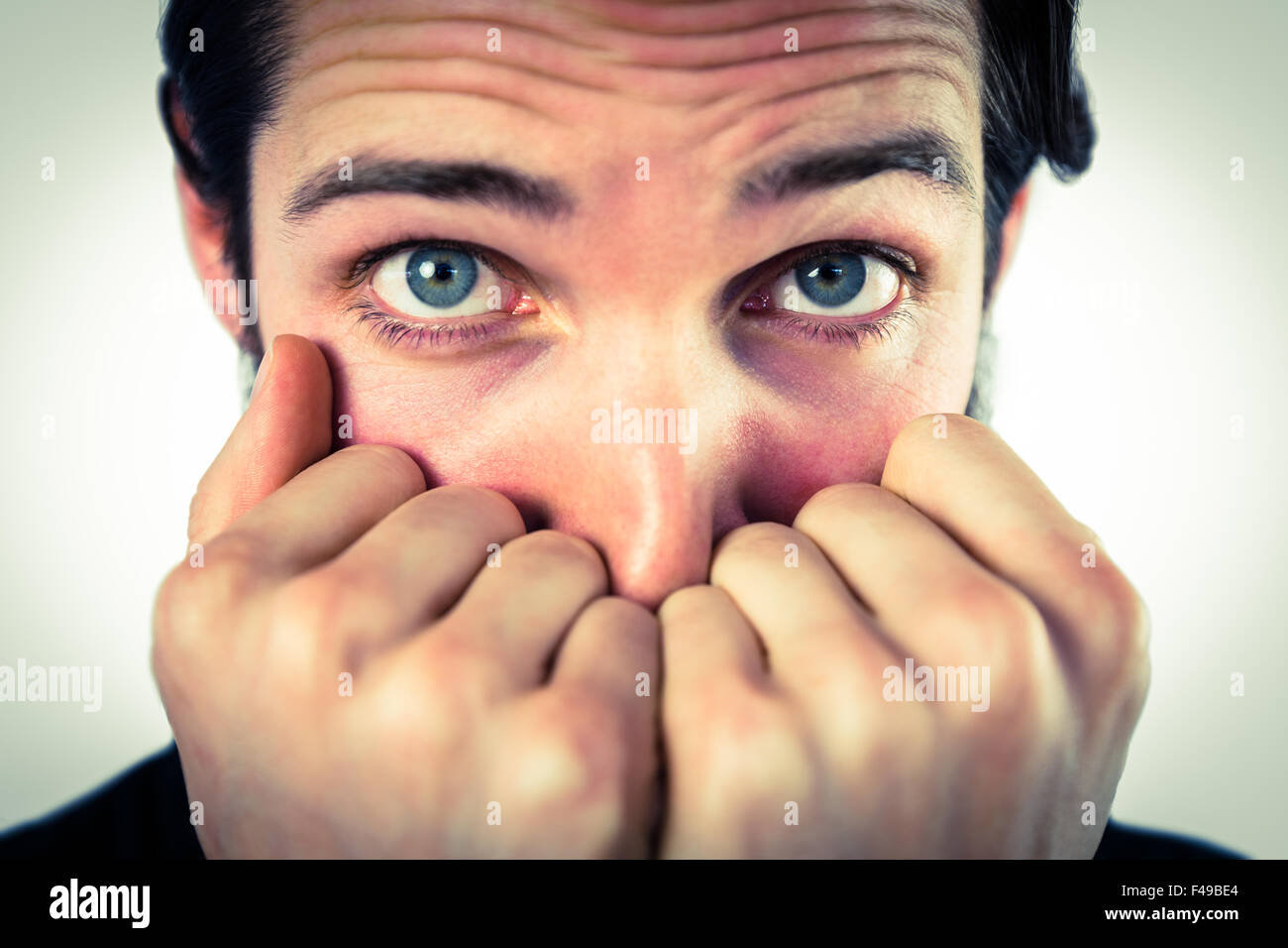 Scared hipster hands face hi-res stock photography and images - Alamy