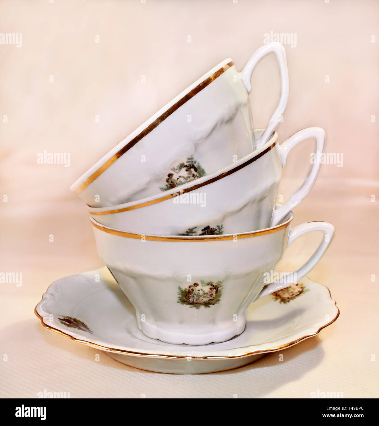 three coffee cups on pink background Stock Photo - Alamy