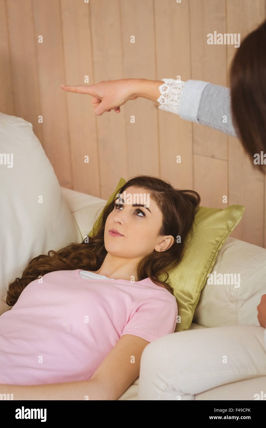 Hypnotist hypnotizing woman hi-res stock photography and images - Alamy