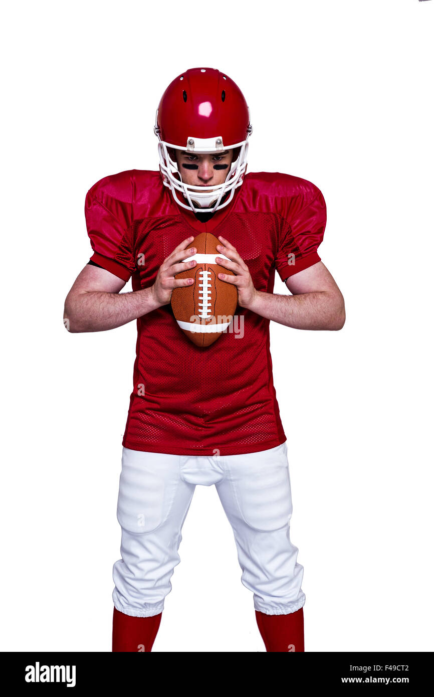 Quarterback holding ball Cut Out Stock Images & Pictures - Alamy