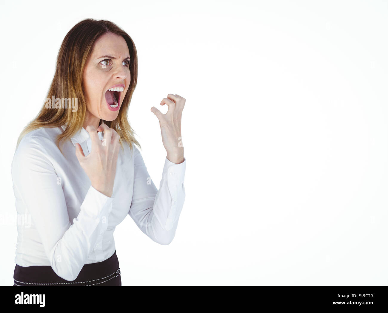 Angry yelling businesswoman Stock Photo - Alamy