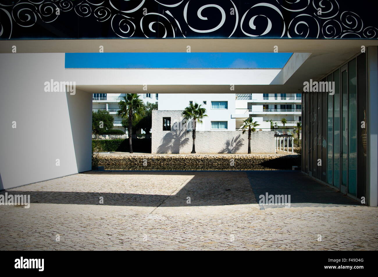 Outdoor open space between buildings with a strong noon shadow Stock ...