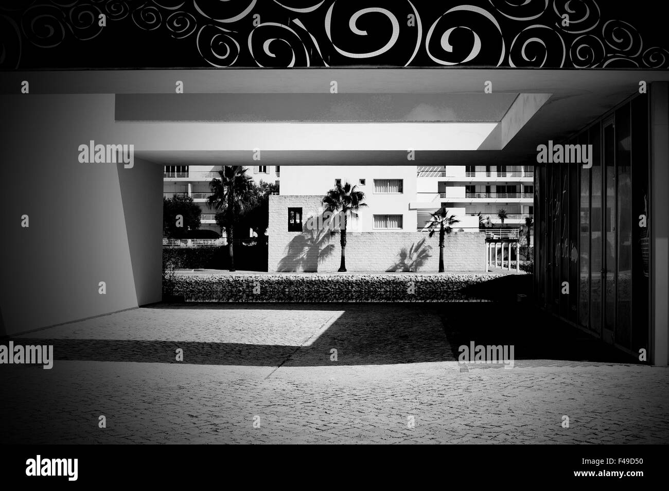 Outdoor open space between buildings with a strong noon shadow Stock ...
