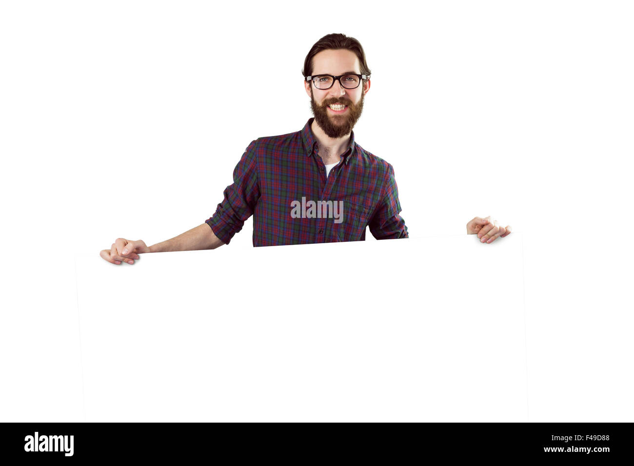 Handsome hipster showing large poster Stock Photo - Alamy