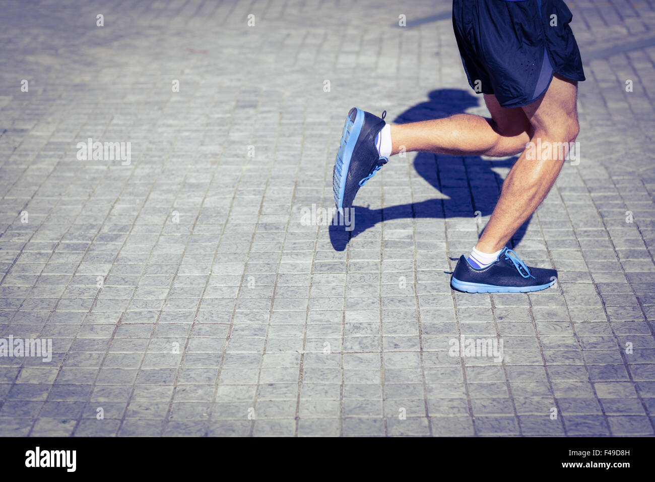 Legs of an athlete running Stock Photo - Alamy