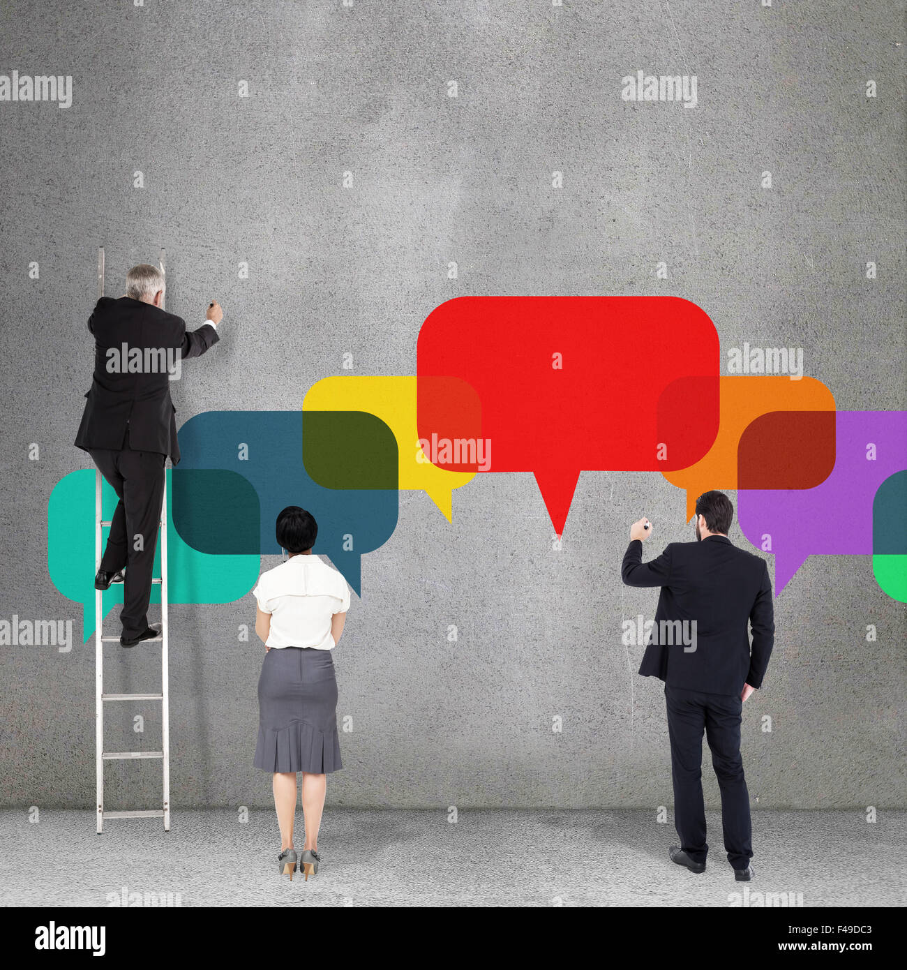 Composite image of business team writing Stock Photo - Alamy