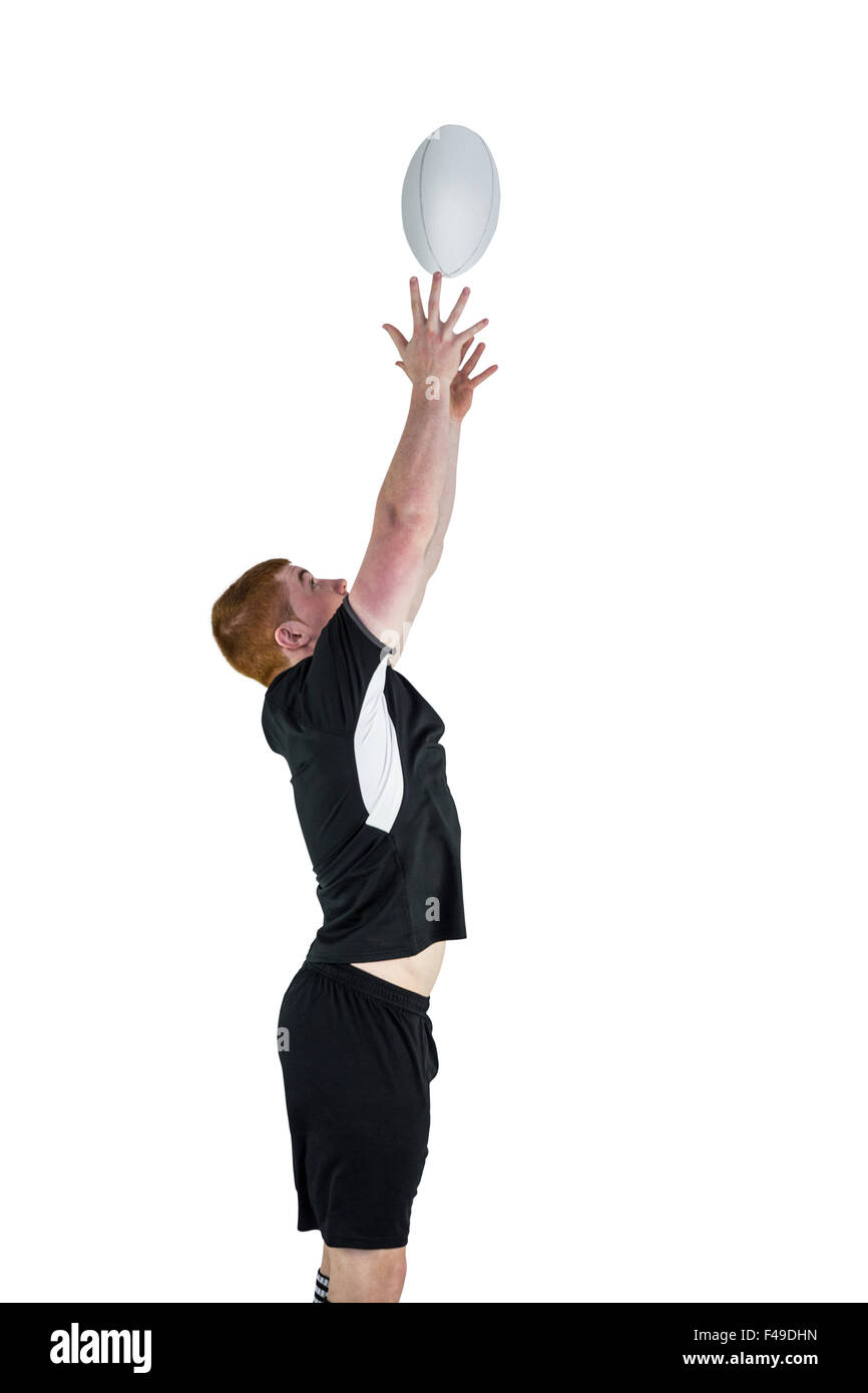 Rugby player catching a rugby ball Stock Photo - Alamy