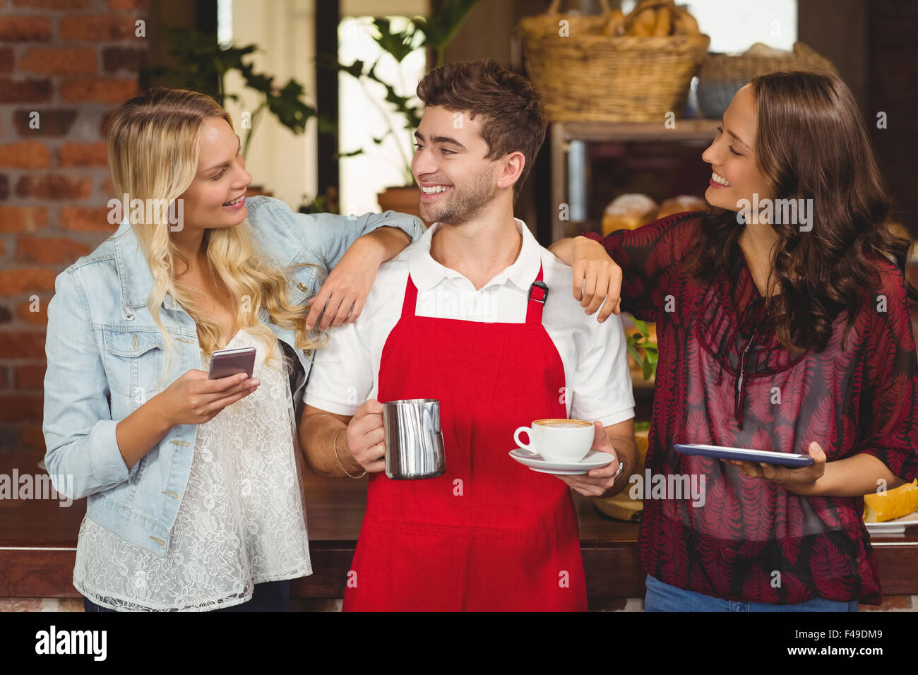 Female owner discussing employee hi-res stock photography and images ...