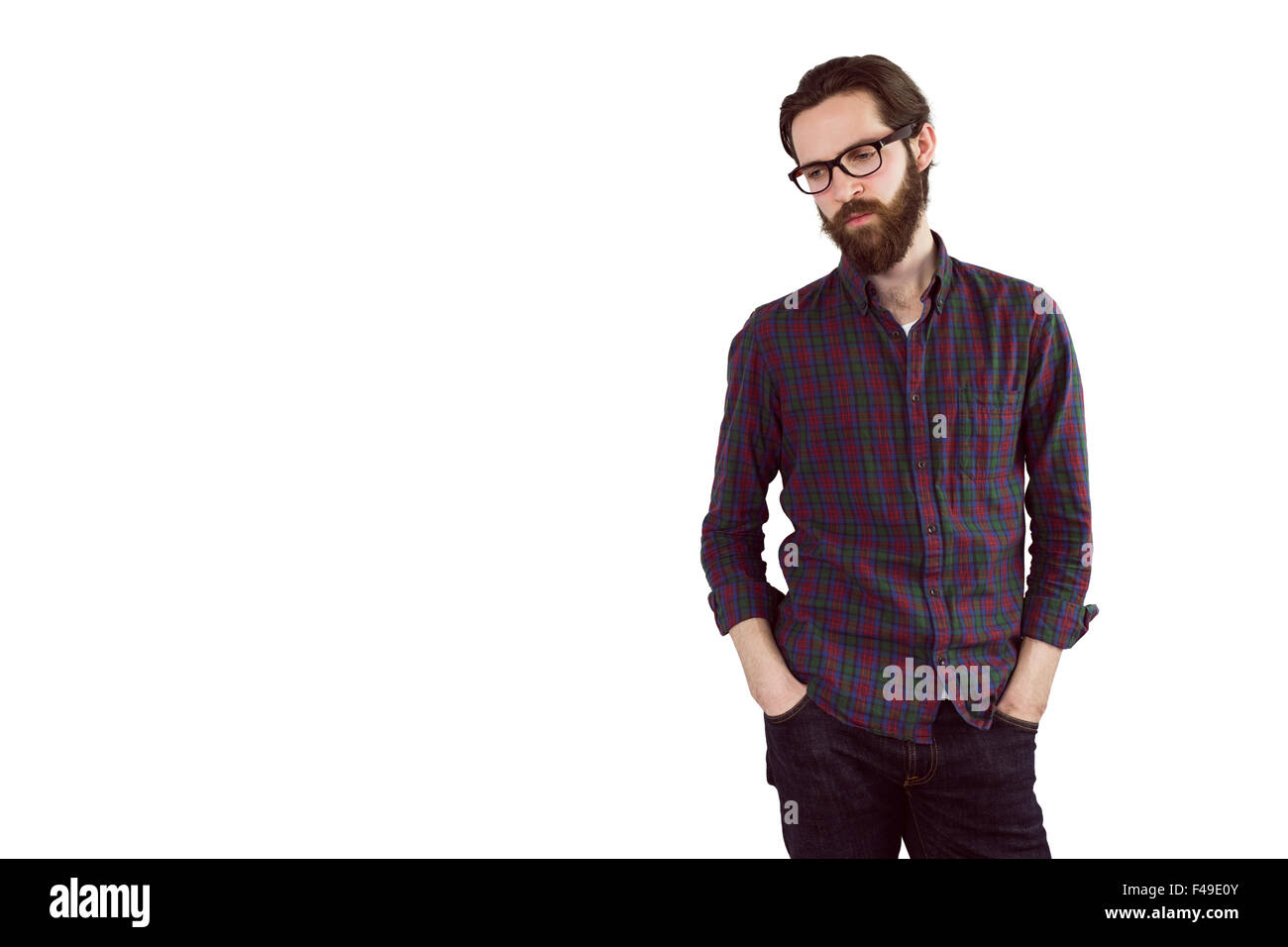 Handsome hipster with hands in pockets Stock Photo - Alamy