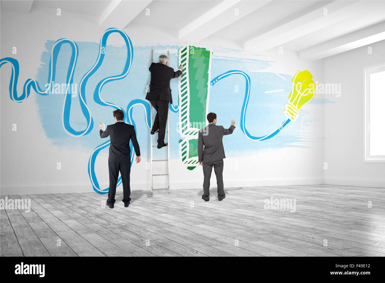 Composite image of business team writing Stock Photo - Alamy