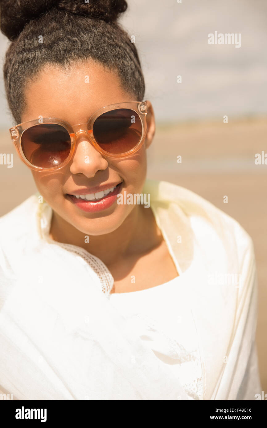 Stylish woman wrapped in scarf Stock Photo - Alamy