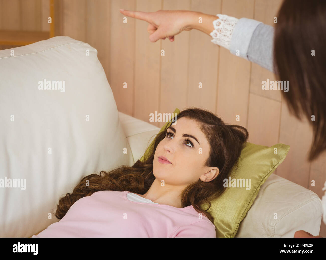 Hypnotist hypnotizing woman hi-res stock photography and images - Alamy