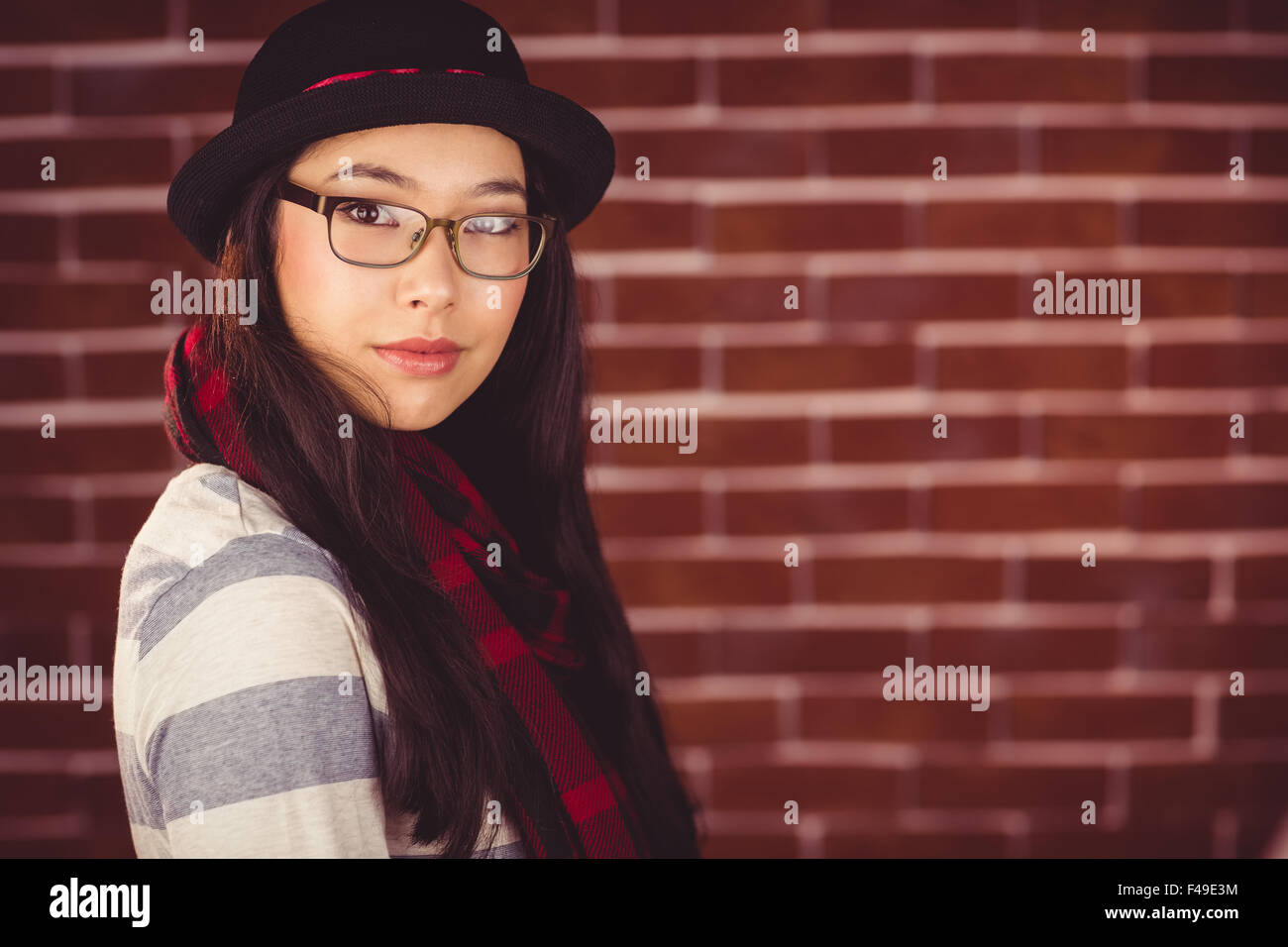 Attractive hipster posing with glasses Stock Photo - Alamy