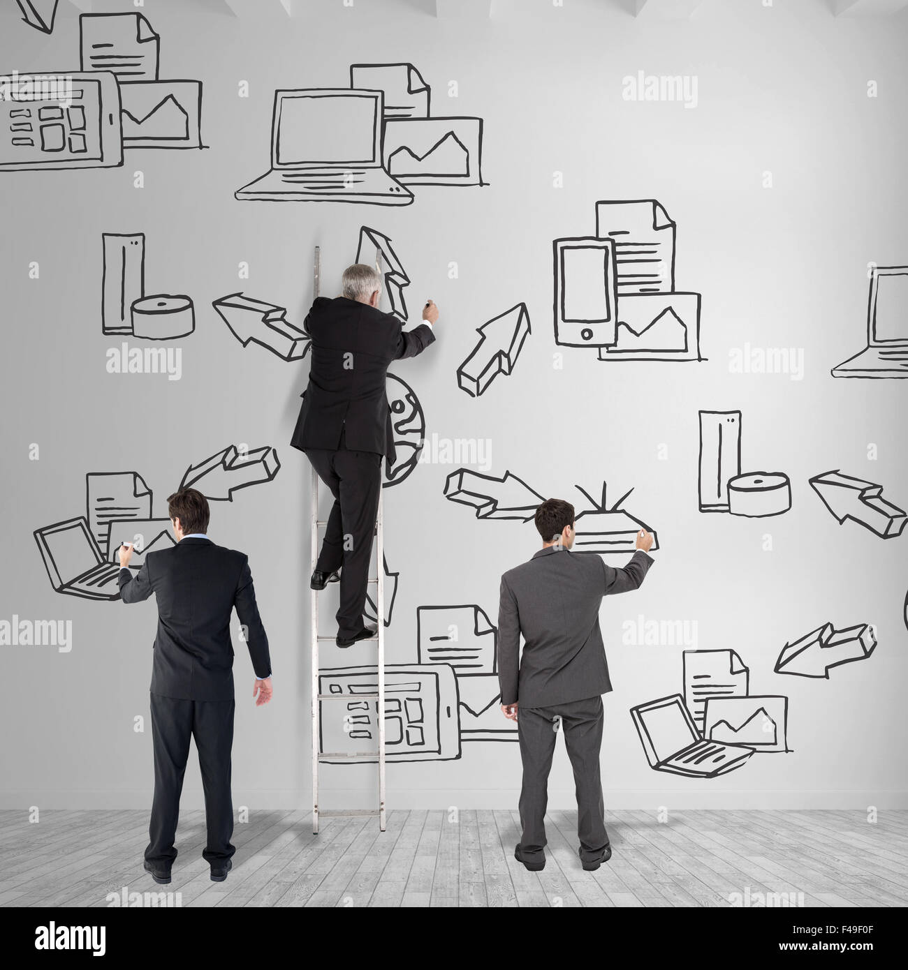 Composite image of business team writing Stock Photo - Alamy