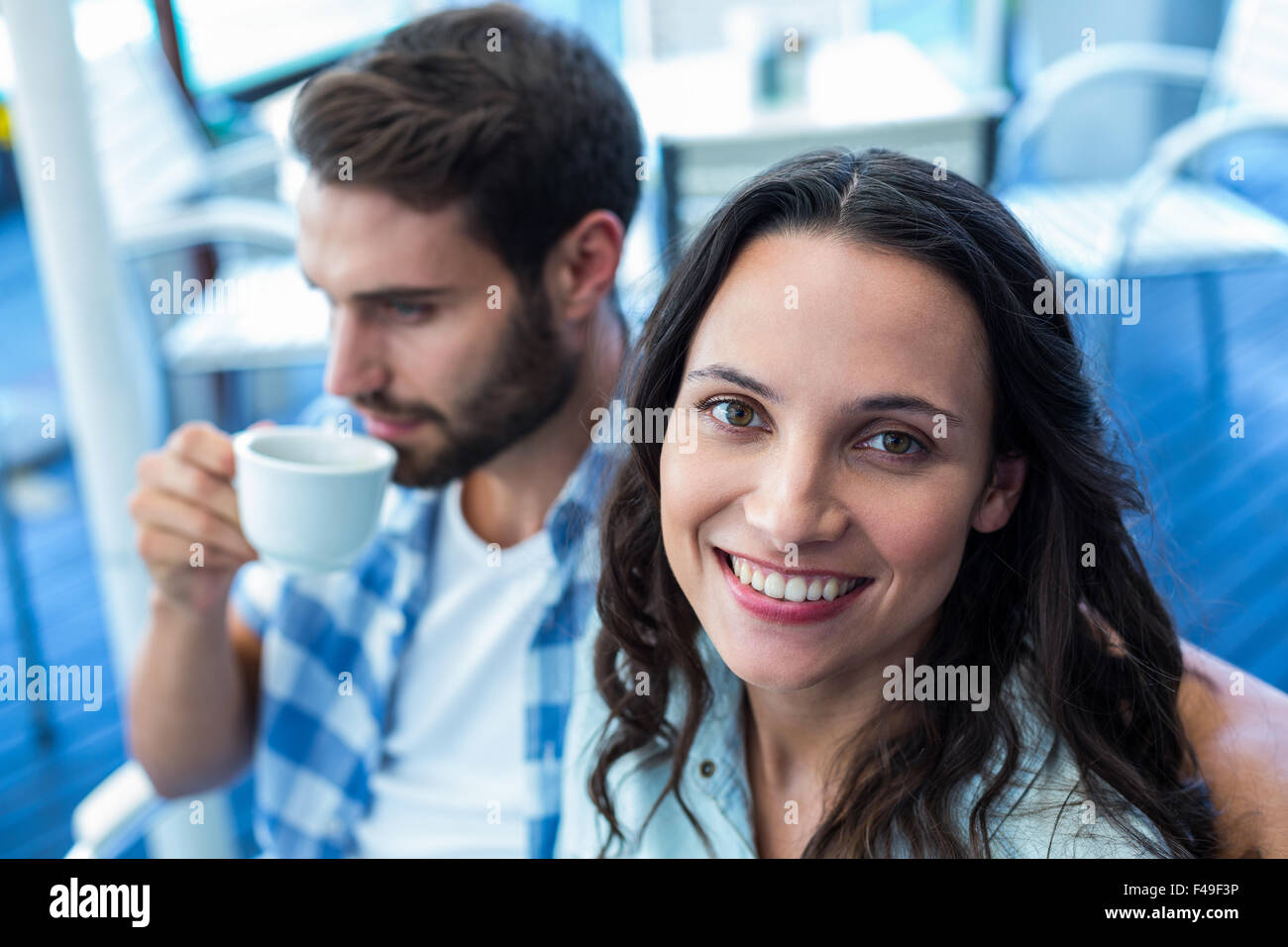 Cute couple having coffee together Stock Photo - Alamy