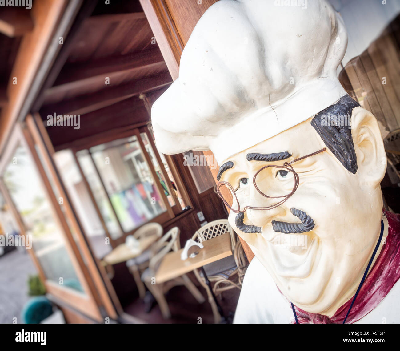 Restaurant Chef Board. Portrait of a Puppet of chef out of a restaurant ...