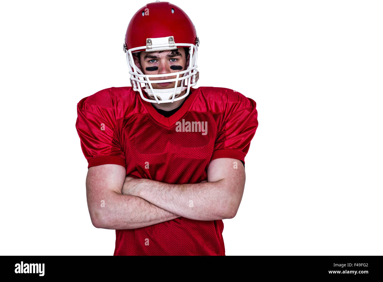 American football player with arms crossed Stock Photo - Alamy