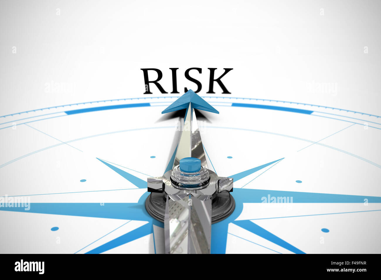 Risk against compass arrow Stock Photo - Alamy