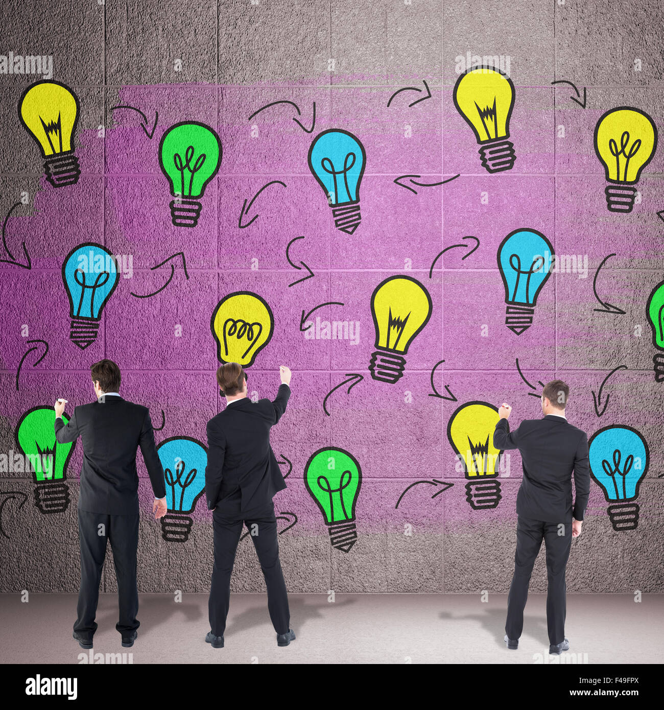 Composite image of business team writing Stock Photo - Alamy