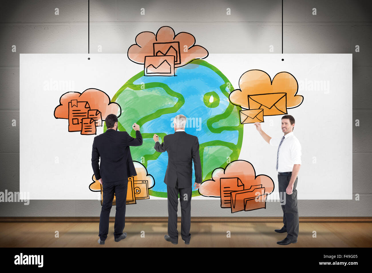 Composite image of business team writing Stock Photo - Alamy