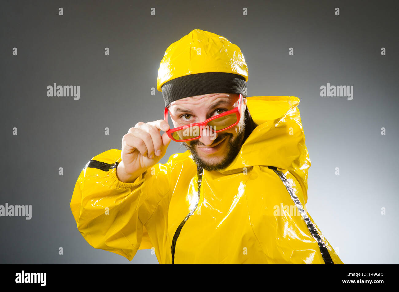 Funny man wearing yellow suit Stock Photo - Alamy