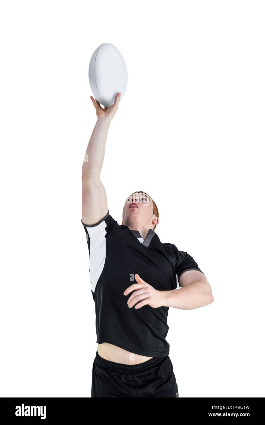 Rugby player catching a rugby ball Stock Photo - Alamy