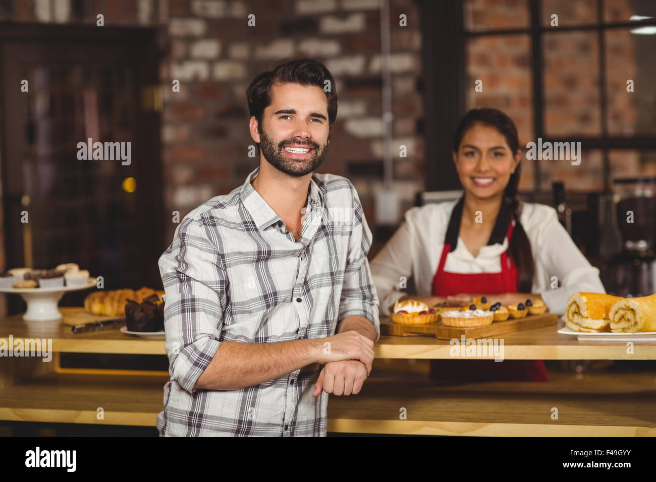 Portrait waitress leaning counter hi-res stock photography and images ...