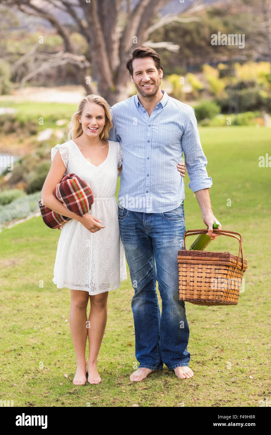 Cute couple on date looking at the camera Stock Photo - Alamy