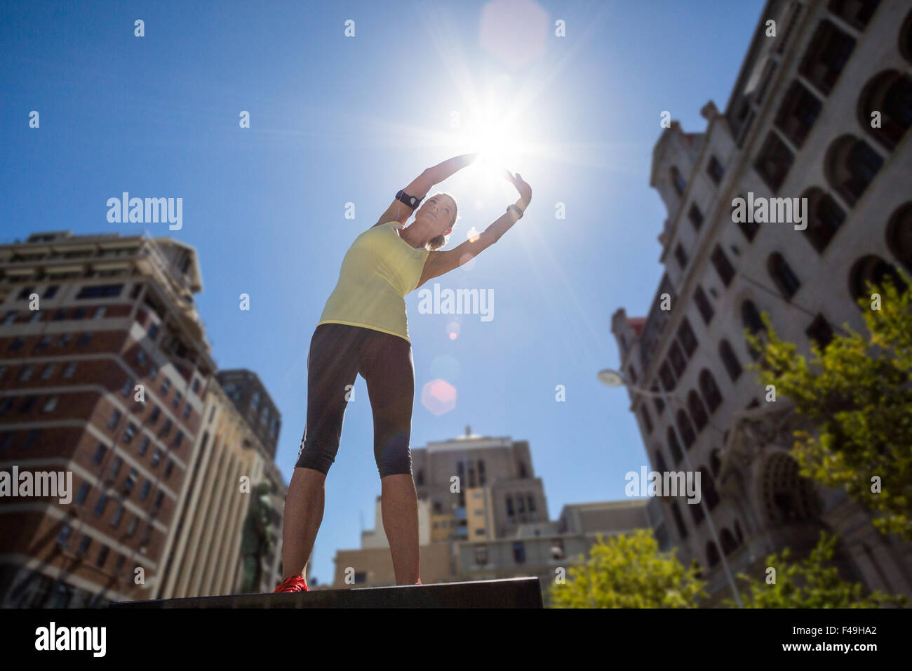 A beautiful woman stretching her arms Stock Photo - Alamy