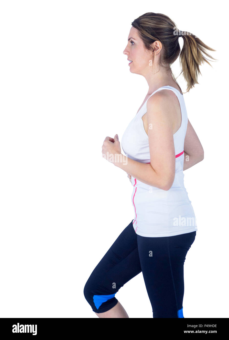Pretty blonde woman running Stock Photo - Alamy