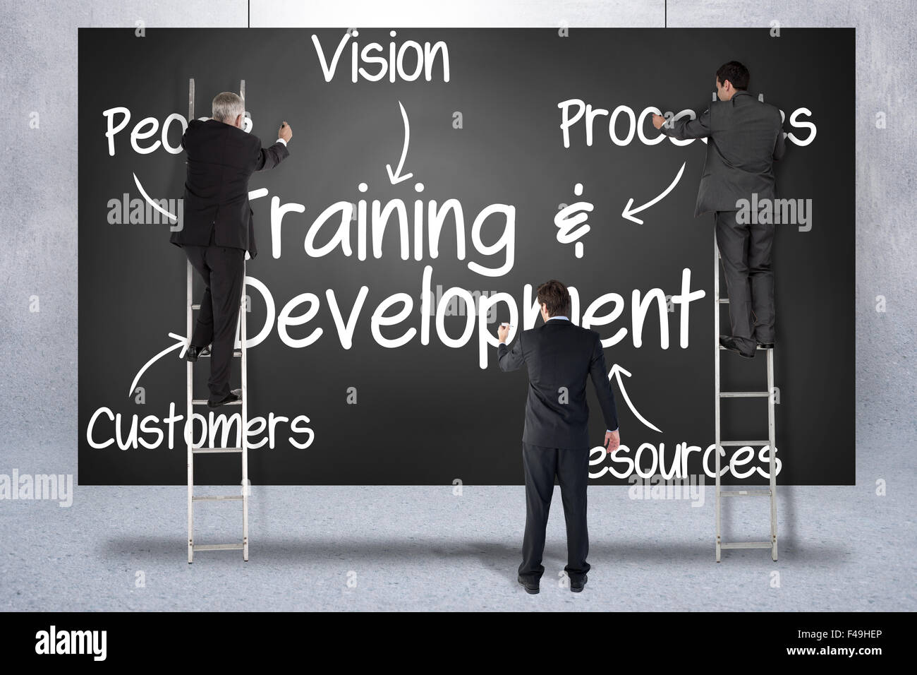Composite image of business team writing Stock Photo - Alamy