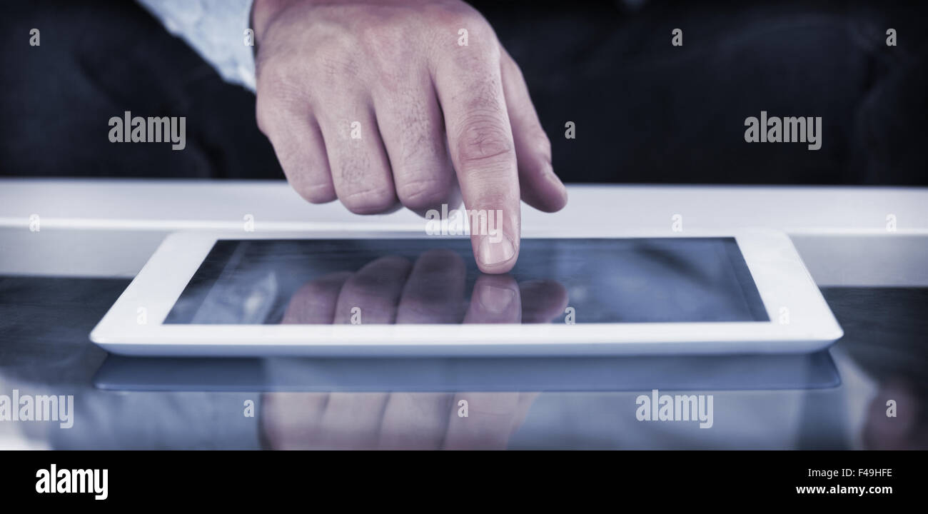 Close up of finger from man touching tablet Stock Photo - Alamy