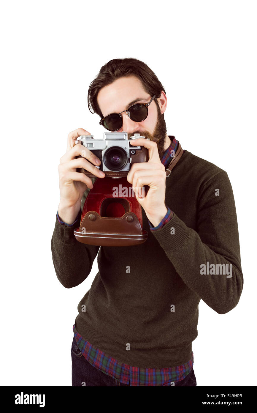 Hipster using his vintage camera Stock Photo - Alamy