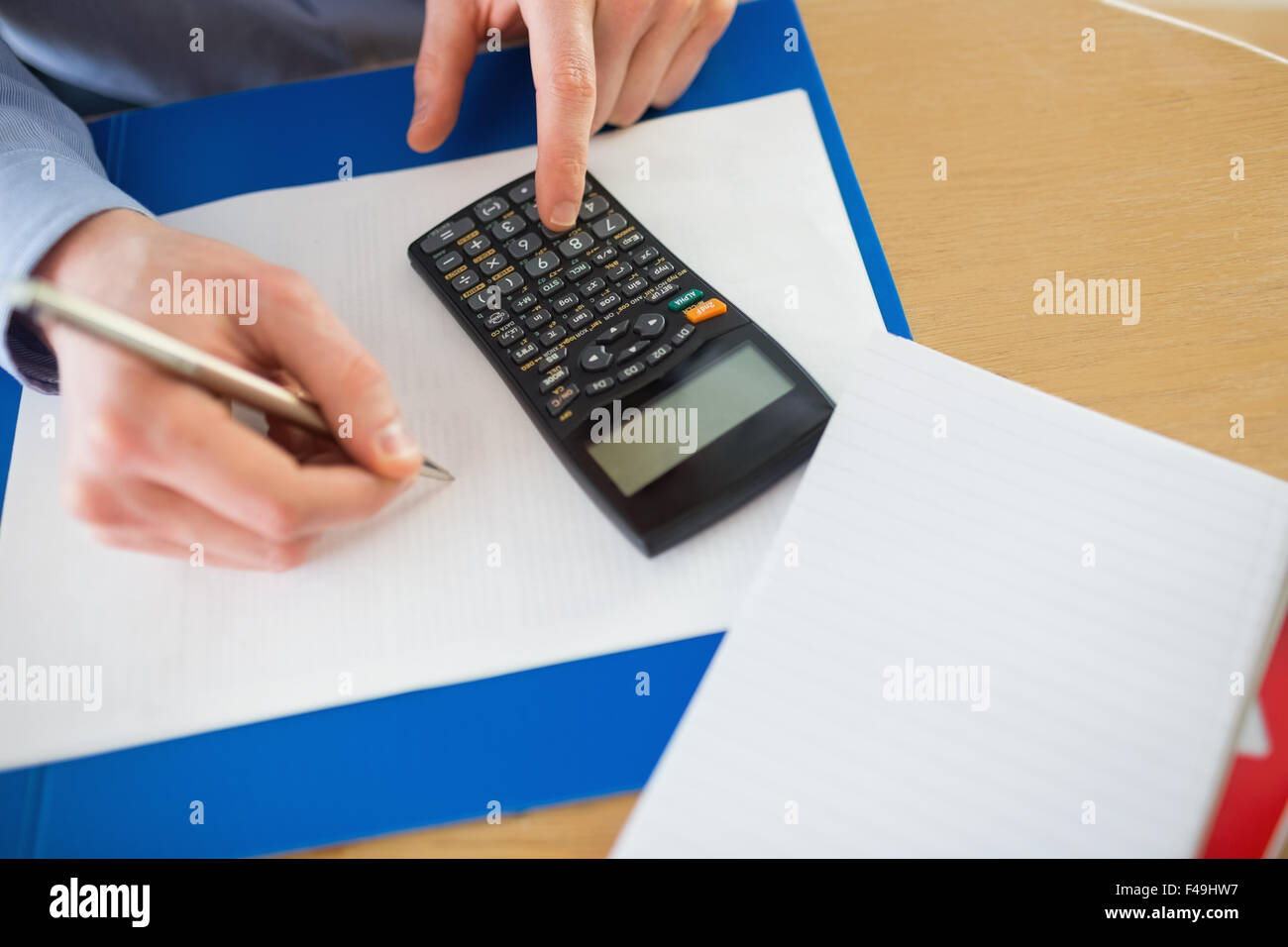 Businessman hands typing and writing Stock Photo - Alamy