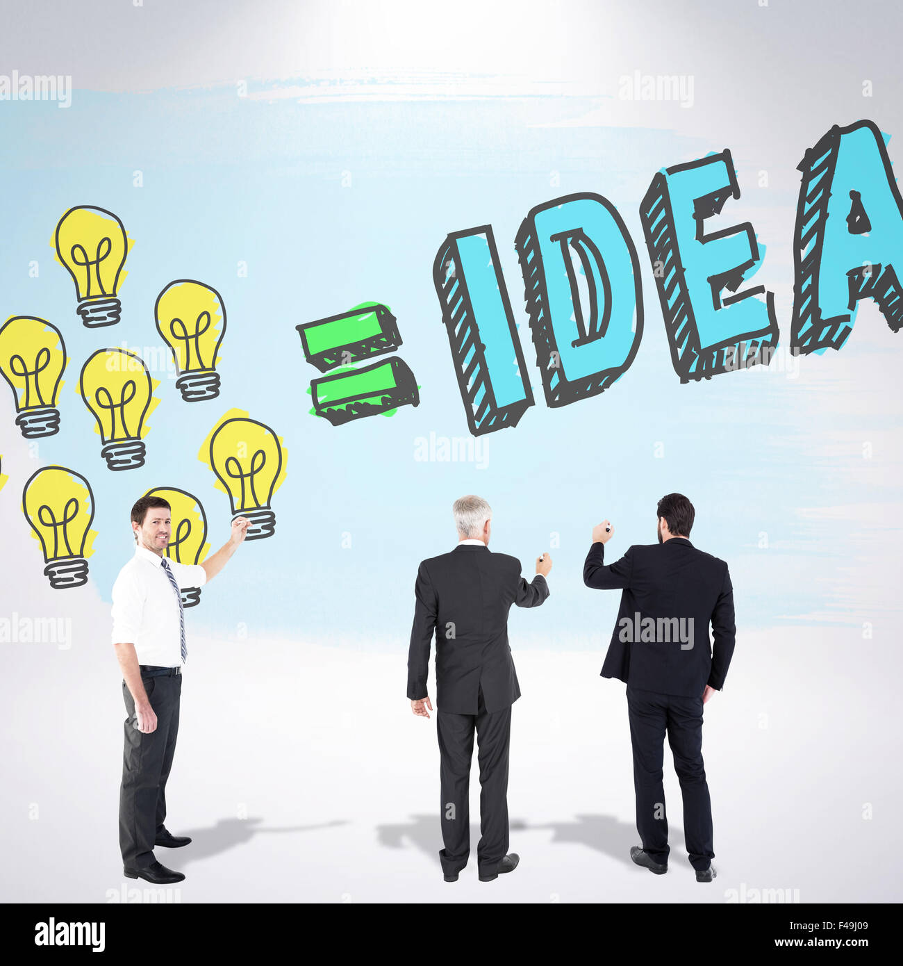 Composite image of business team writing Stock Photo - Alamy